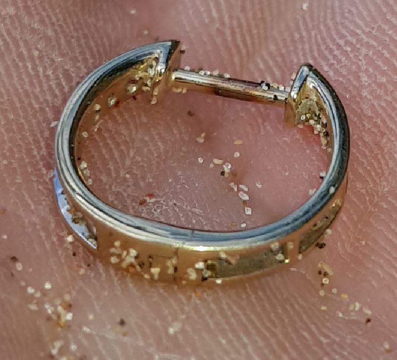 Tiny Gold Ear Ring Found in Sand at Cable Bay.
